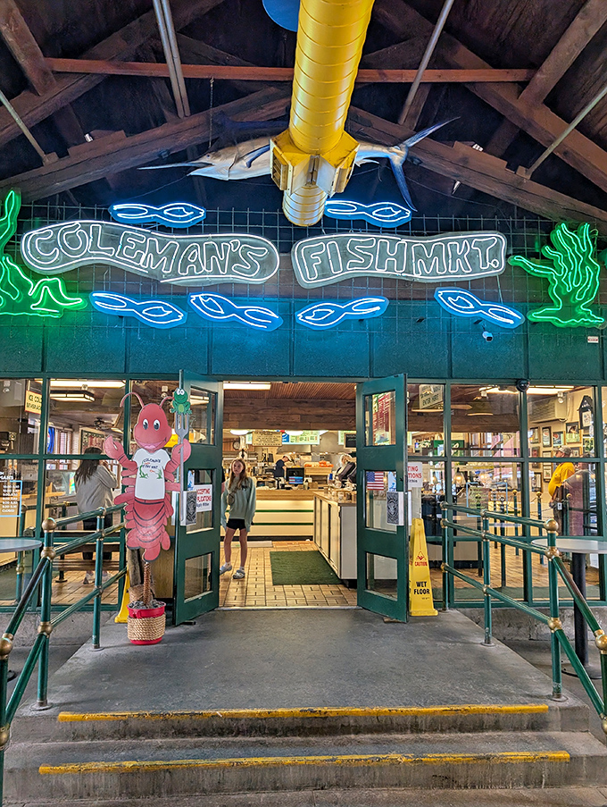 The hanging swordfish and vintage neon create that perfect old-school fish market vibe that usually means you're about to eat something legendary.