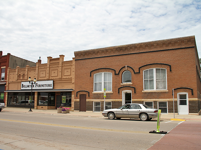 The Des Moines Realty Mart occupies a corner of Cresco's historic downtown, where brick buildings tell stories of the past.