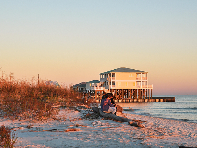 The perfect sunset spot on Dauphin Island where the sand meets the Gulf and worries dissolve faster than an aspirin. Nature's stress management program at work.
