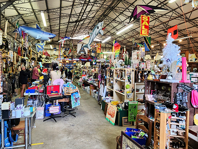 Colorful flags and sea creatures dangle from the ceiling, creating a whimsical underwater world for shoppers to dive into.