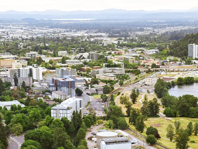 From this bridge, Eugene reveals itself as both university town and retiree haven&mdash;where fixed incomes meet flexible living options.