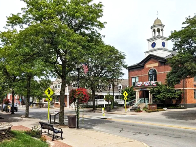 The historic smokestack watches over Fairport's canal like a friendly giant, remembering when this waterway was America's superhighway.