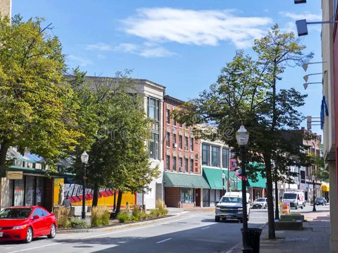 The classic brick charm of Fitchburg's Main Street evokes nostalgia for America's industrial heyday, when mills powered prosperity.