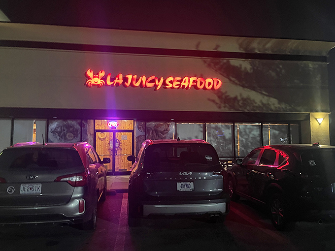 Night falls but LA Juicy Seafood's sign shines bright like a spicy seafood beacon. Your fingers will be happily messy in about 20 minutes!