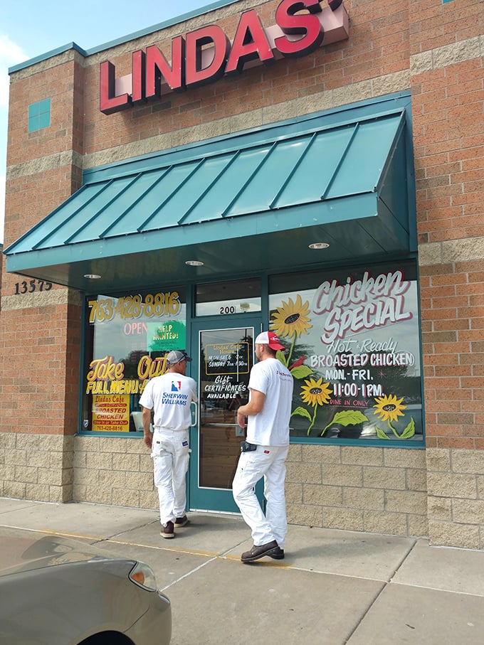 Linda's Cafe entrance: "Where painters in white overalls and executives in suits find common ground over perfectly cooked eggs. Minnesota breakfast democracy!"