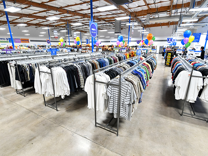 Rows upon rows of carefully organized clothing await at this Goodwill. A rainbow of possibilities at prices that make sense!