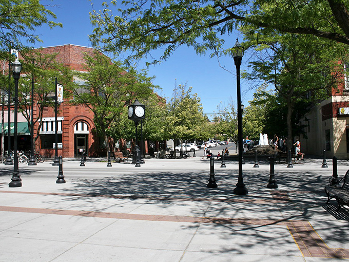 Dappled sunlight plays across Moscow's downtown plaza, where strangers become friends over coffee and conversation.
