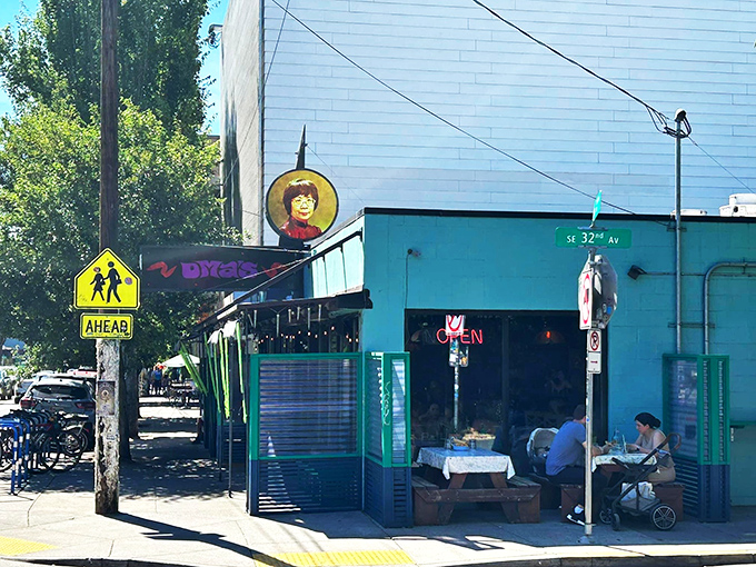 The vibrant signage of Oma's Hideaway hints at the bold fusion flavors waiting inside. 