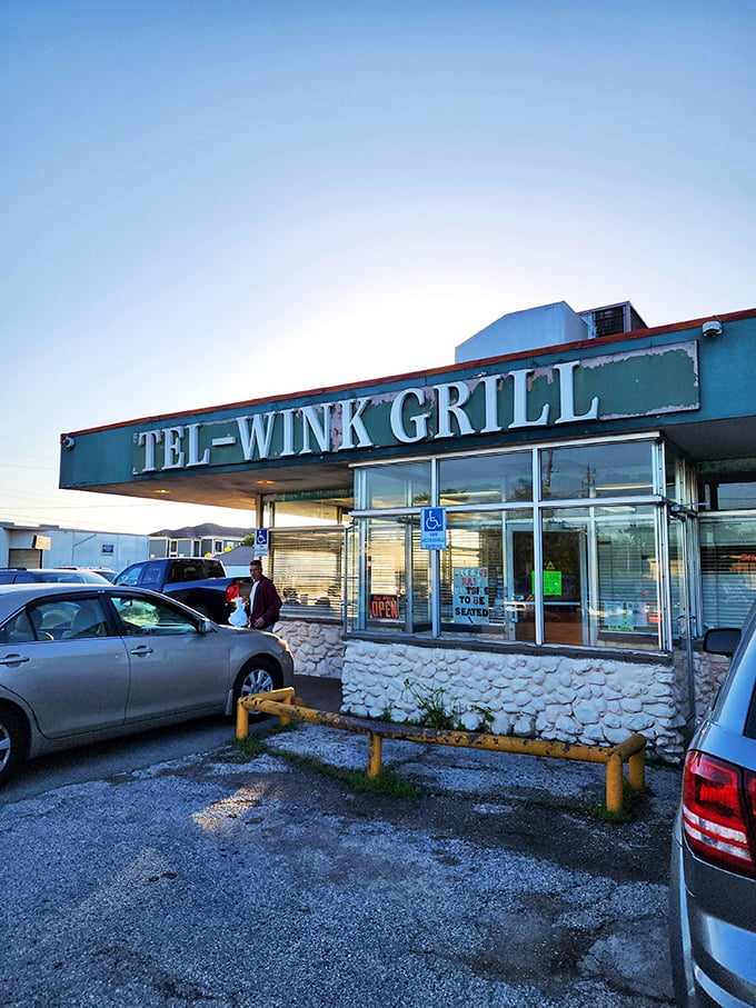 The sun setting behind Tel-Wink's sign feels symbolic&mdash;some places just shine brighter when most restaurants are calling it a day.