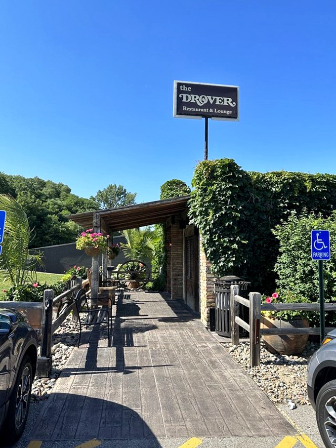 Lush greenery frames The Drover's welcoming fa&ccedil;ade &ndash; nature's way of highlighting one of Omaha's most beloved steak institutions. 