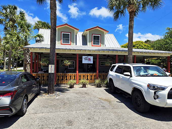 Palm trees and porch seating—The Lost Dog Cafe masters the art of making breakfast feel like your most important vacation activity.