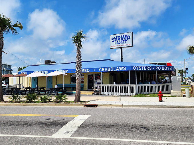 The Shrimp Basket: Blue trim, yellow walls, and a straightforward sign &ndash; because when your seafood's this good, you don't need fancy marketing.