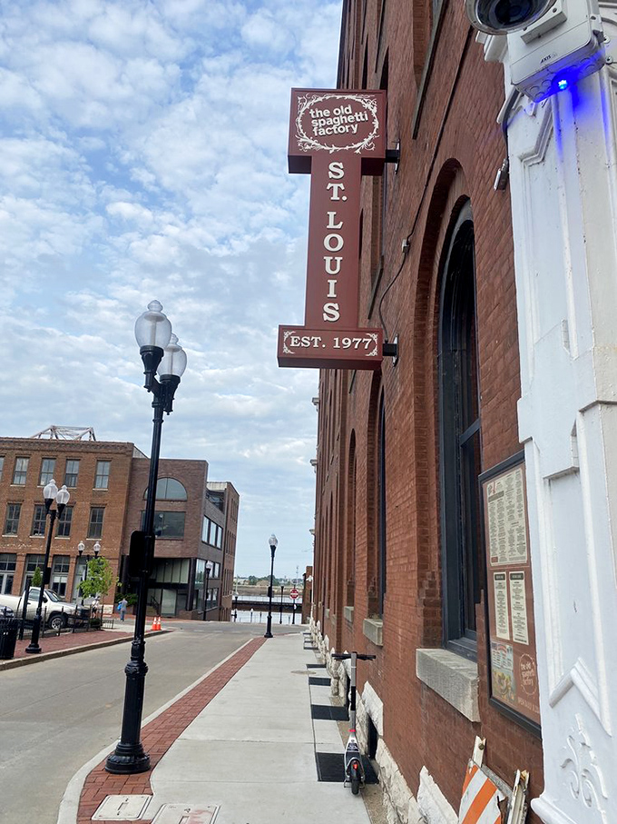 Historic charm meets Italian comfort food at The Old Spaghetti Factory. That classic brown sign has been guiding noodle lovers for generations.