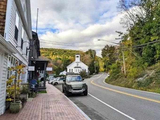 Washington's main street offers a perfect blend of historic buildings and modern convenience, with cars lining both sides.