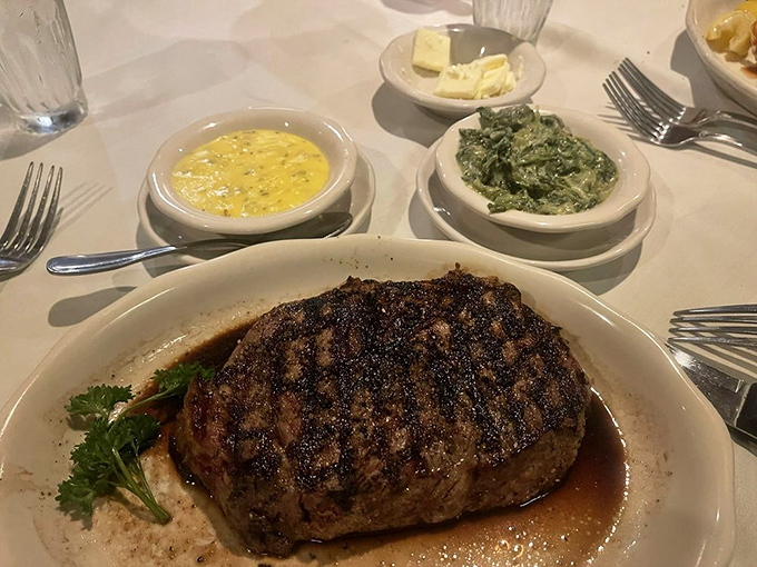 This ribeye isn't just marbled, it's practically wearing a tuxedo. With sides this good, the table becomes a miniature feast.