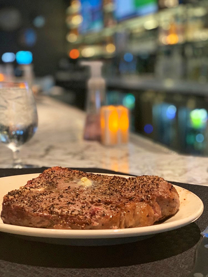 This steak doesn't just sit on the plate&mdash;it commands it, with a peppercorn crust that's earned every bit of its prime real estate.