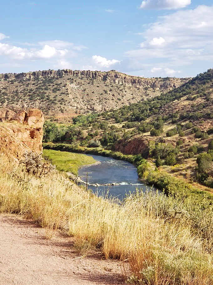 The Arkansas River carves its ancient path through ruddy cliffs and green pockets of wilderness - nature's ultimate stress reducer.