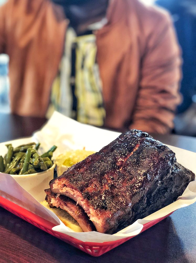 These ribs don't just fall off the bone&mdash;they practically leap with joy. The glistening bark holds secrets only low-and-slow cooking can reveal.