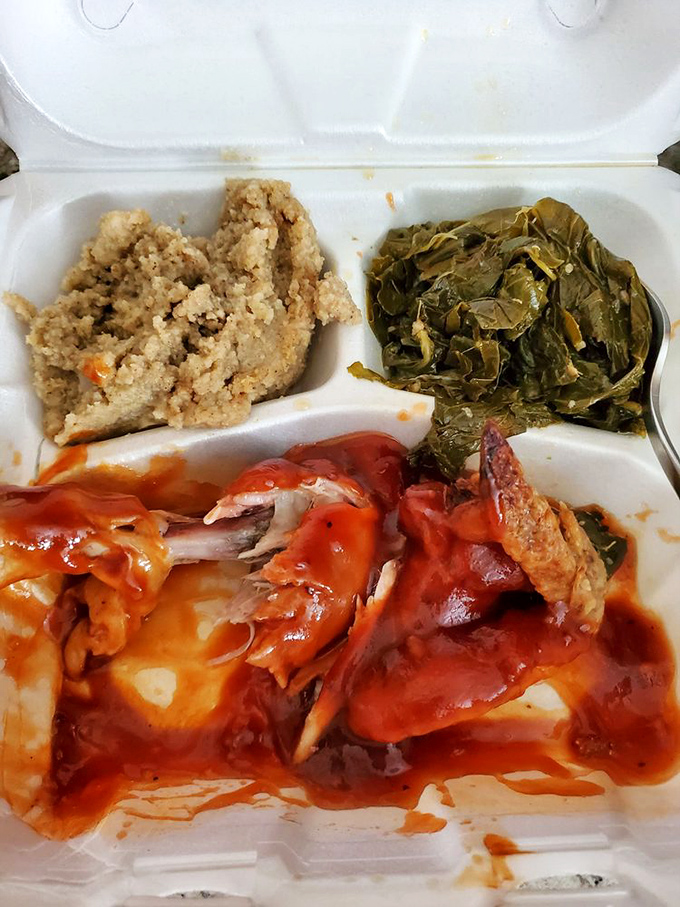 Soul food trifecta: saucy BBQ, perfectly seasoned greens, and cornbread that doesn't know it's not cake. This is what they mean by "comfort food."