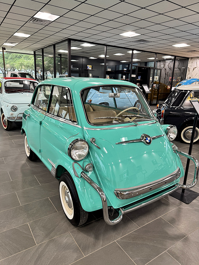The mint-condition BMW Isetta looks ready for a Mediterranean coastal drive. This bubble car proves that German engineering can be whimsical too.