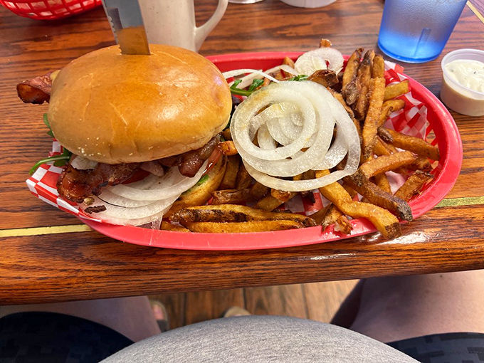 A burger that demands to be photographed before eaten. Those thick-cut fries aren't just sides&mdash;they're co-stars in this delicious production.