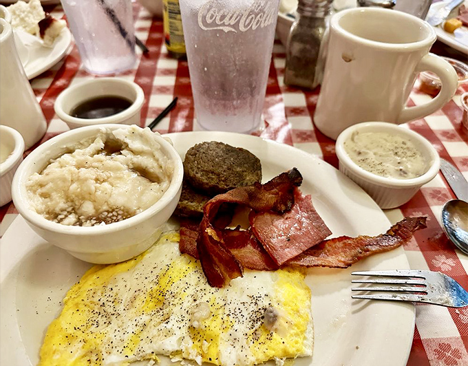 Grits, eggs, bacon, and sausage&mdash;the breakfast quartet that performs a symphony of flavor every morning at the Loveless.