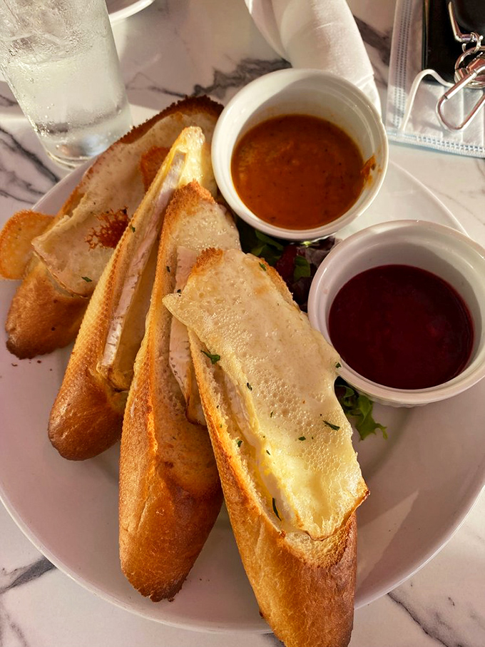 Baked brie and crusty bread: the culinary equivalent of a warm hug after a long, difficult day at the office.