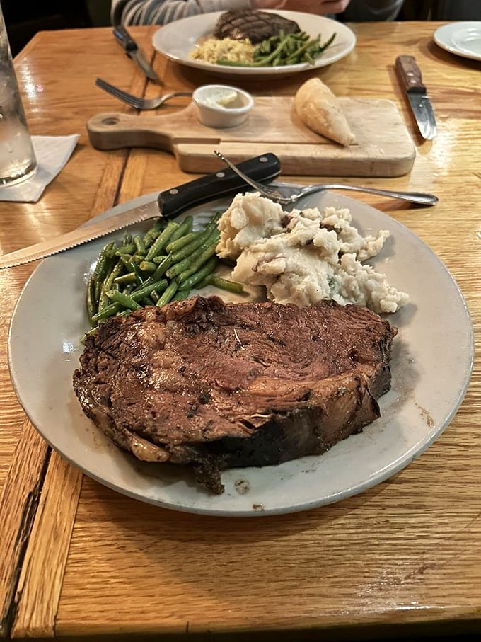 The kind of steak that makes vegetarians temporarily question their life choices. Those potatoes look like they've been whipped into cloud-like submission.