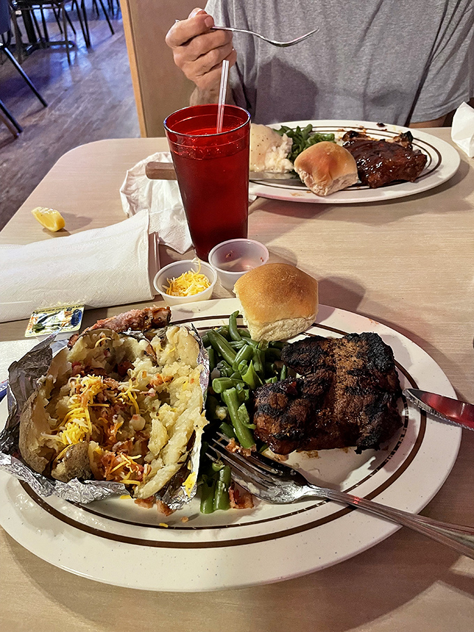 Table for two, please, with a side of green beans that somehow make you feel virtuous while demolishing a steak bigger than your face.
