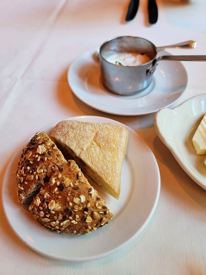 Bread service at L'Auberge isn't just a prelude&mdash;it's the opening act of a culinary concert. That multi-grain loaf has more layers than a winter wardrobe in Minnesota.