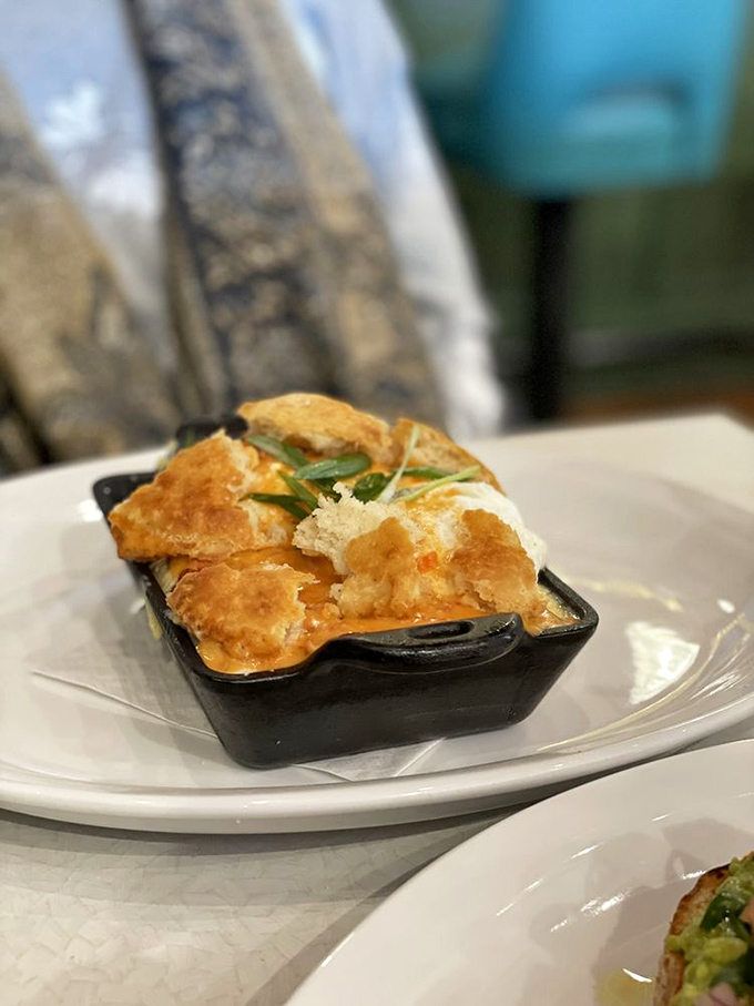 Not all heroes wear capes&mdash;some come in cast iron skillets with perfectly melted cheese and a side of buttery biscuit.