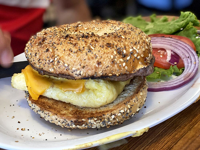 Not your average breakfast sandwich. This everything bagel cradles eggs and cheese with the tender loving care of a parent holding their firstborn.