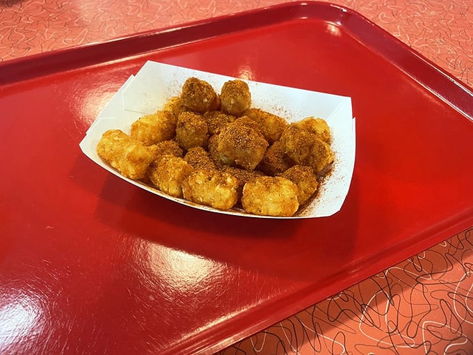 These Cajun tots aren't just potato nuggets&mdash;they're little golden flavor bombs waiting to detonate your taste buds with spicy, crunchy goodness.