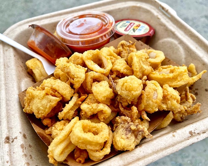 Golden-fried calamari that would make Mediterranean fishermen nod in approval. Crispy, tender, and begging to be dunked in that marinara sauce.