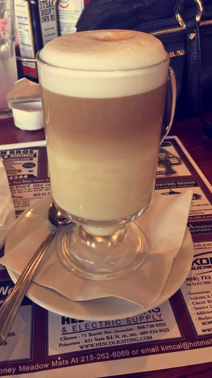 This isn't just coffee&mdash;it's a frothy cloud of comfort in a glass. The perfect companion for menu deliberations or post-burger contemplation.