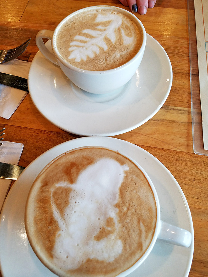 Latte art so pretty you almost feel guilty disturbing it. Almost. Coffee this good deserves your full, undivided attention.