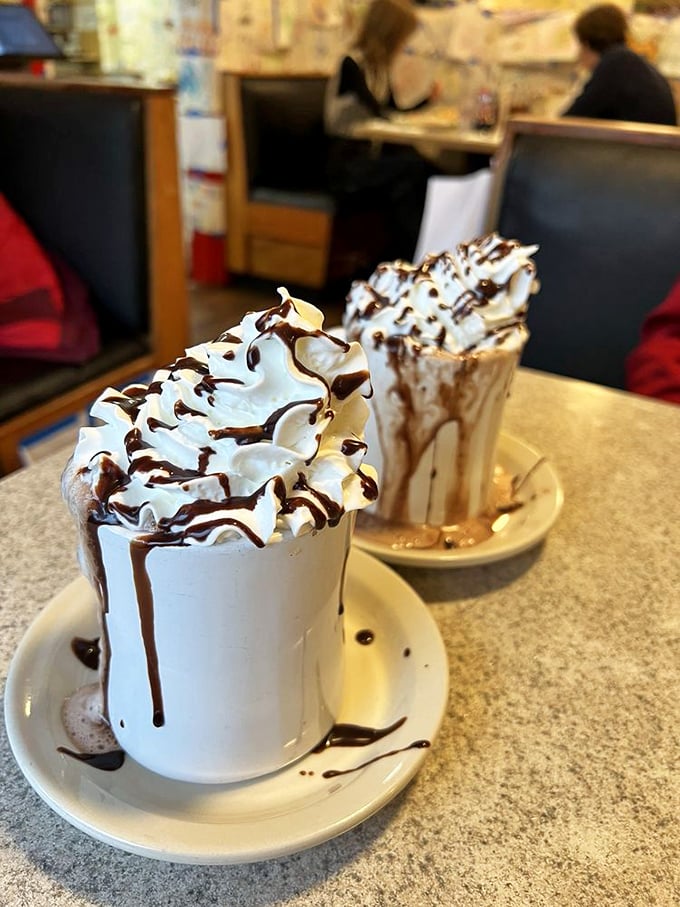 These aren't just hot chocolates&mdash;they're architectural wonders of whipped cream and chocolate drizzle that make Monday mornings bearable again.