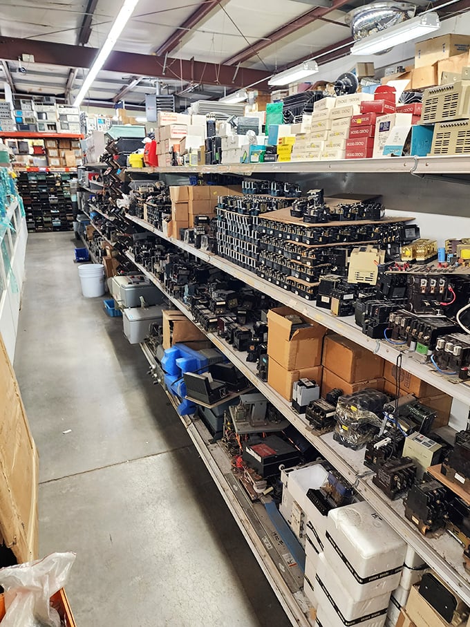 Electronic components organized with the precision of a mad scientist's lab. Somewhere in these bins lies the exact part you've been hunting for.