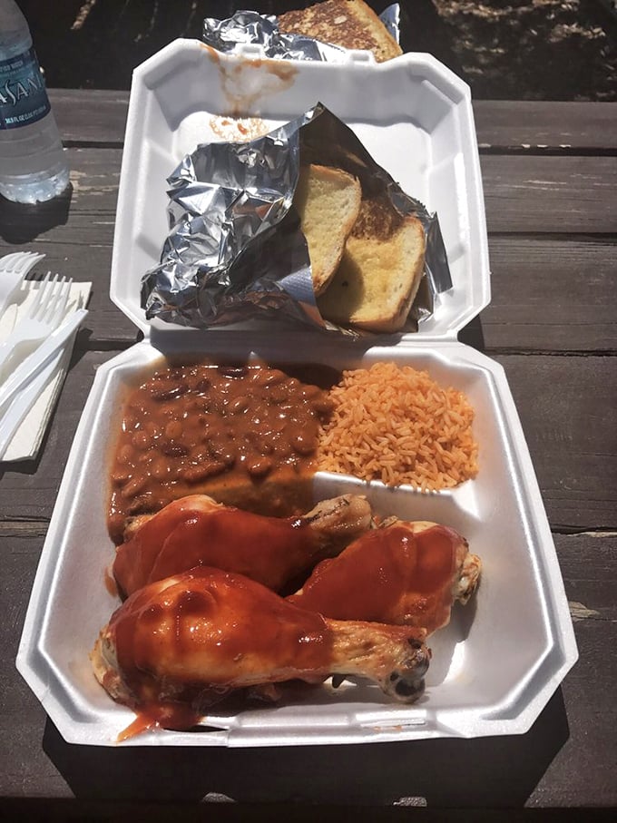 Chicken that didn't die in vain! These sauce-slathered legs swimming alongside rice and beans create the comfort food trifecta.