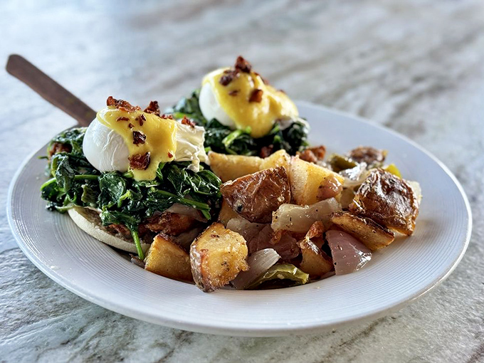 This Benedict doesn't just break the rules – it rewrites them entirely. Crispy home fries on the side are the supporting actors deserving their own award.