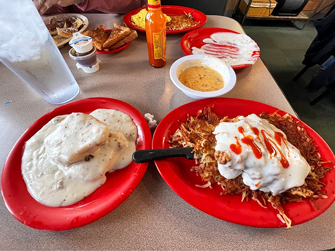 Chicken fried steak swimming in gravy like it's training for the breakfast Olympics. This isn't just a meal&mdash;it's a declaration of morning independence from boring breakfasts.