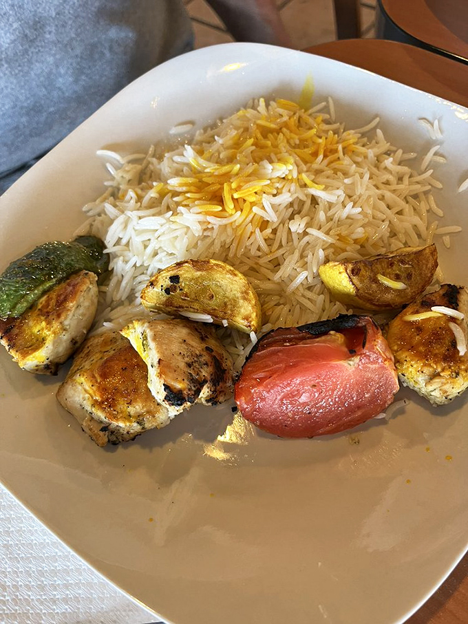 Saffron rice provides the perfect stage for these chicken kabob stars to perform their savory magic.