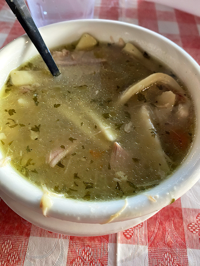 This chicken noodle soup isn't medicine&mdash;it's time travel in a bowl, with hearty noodles and chunks of chicken swimming in liquid comfort.