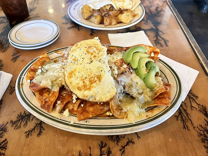 Breakfast nachos that make you question why we don't start every day with chips, cheese, eggs and avocado. Morning game-changer.