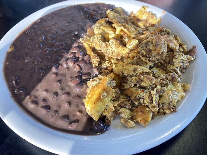 Black beans meet scrambled eggs in a dish that proves breakfast doesn't need to be confined to one culinary tradition to be absolutely magnificent.