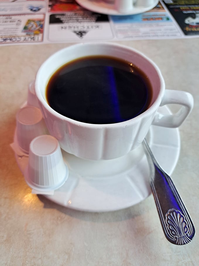 The humble diner coffee cup&mdash;holding the elixir that's launched a thousand road trips and solved countless crossword puzzles.