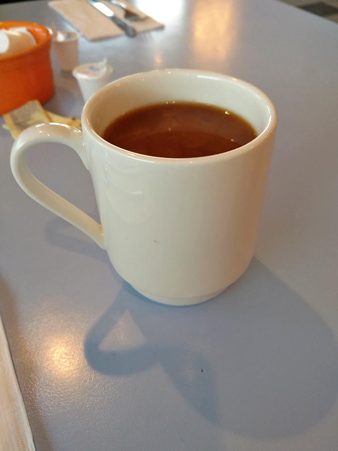 That first sip of diner coffee &ndash; the liquid alarm clock that doesn't just wake you up, it makes you glad you're awake.