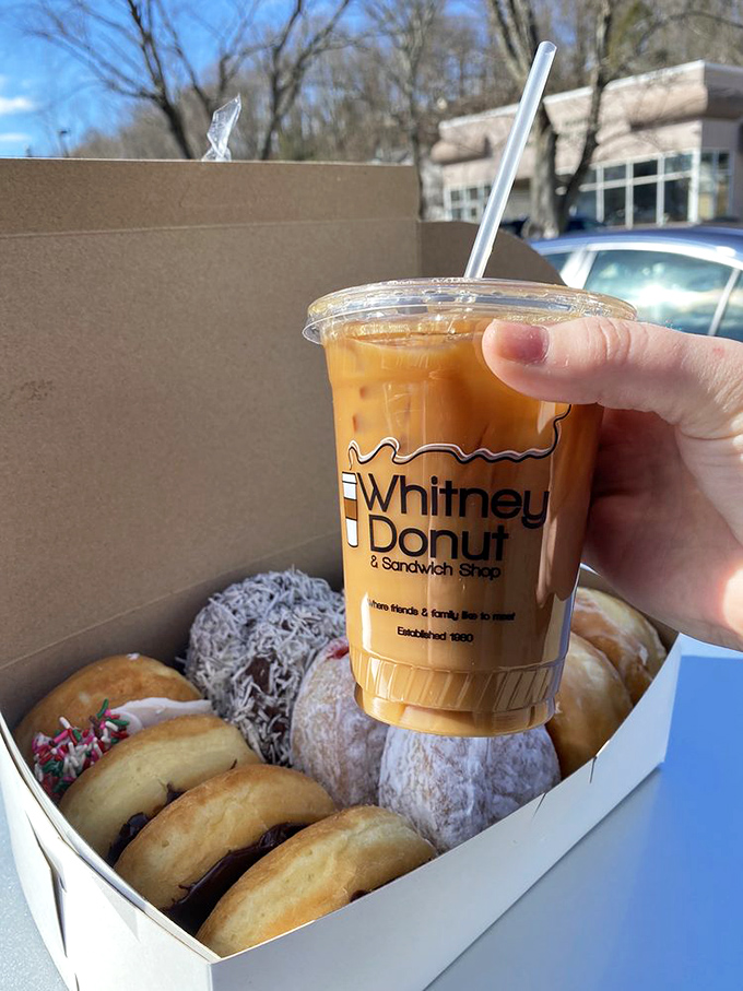 Whitney Donut's box of joy comes with a side of caffeine - the perfect Connecticut morning in portable form. 