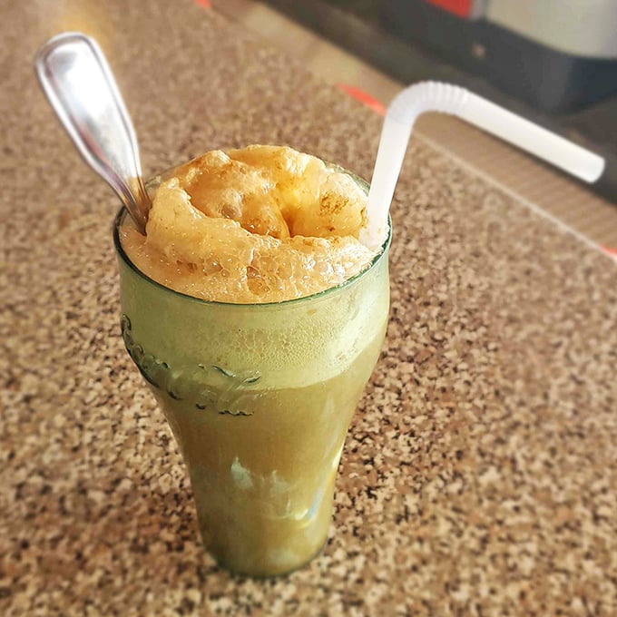 Sometimes the simplest pleasures hit hardest - like this perfectly crafted Coke float with whipped dreams. Photo credit: Pleasant Hill Diner
