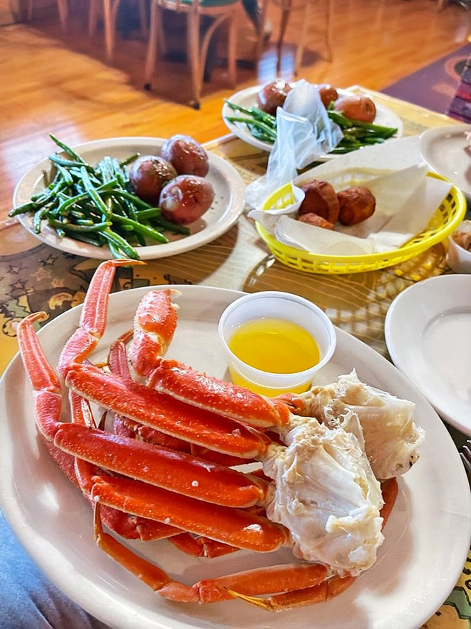 Snow crab legs arranged like nature's perfect puzzle – a delicious game of "crack, dip, savor" that's worth every bit of effort.